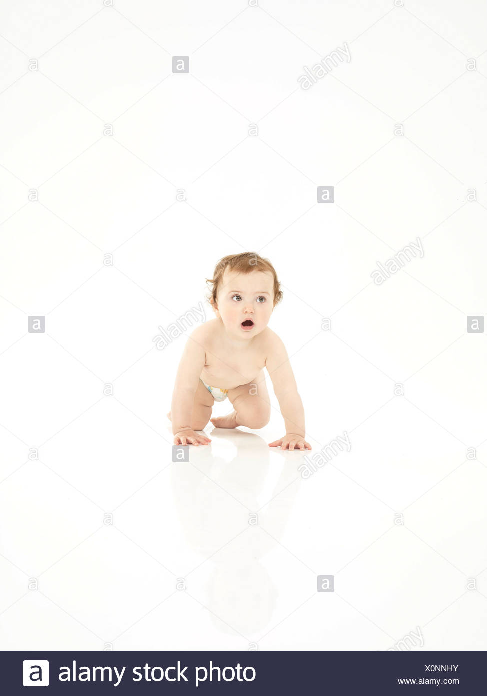 Crawling Baby In Diapers High Resolution Stock Photography and Images ...