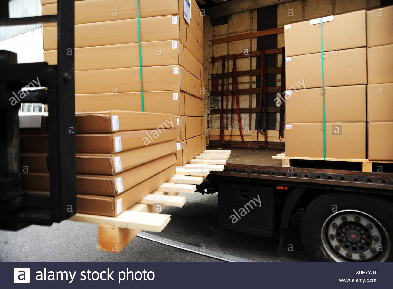 Fork Lift Truck Loading Boxes Stock Photos & Fork Lift Truck Loading ...