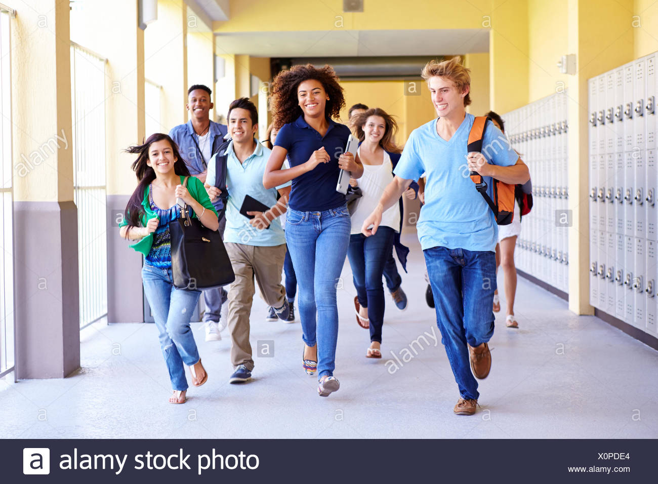 Happy Students Running High Resolution Stock Photography and Images - Alamy