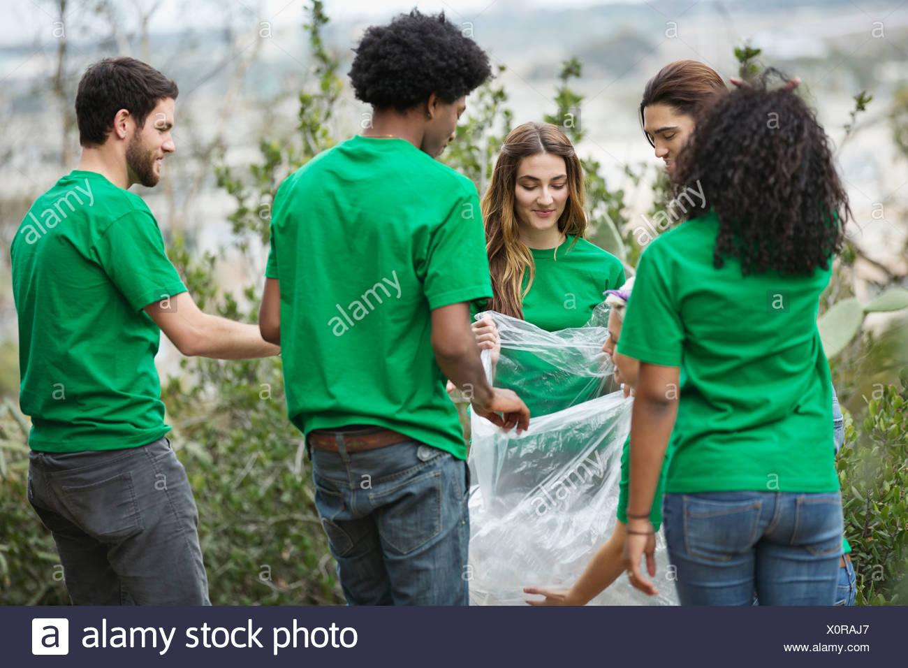 People Collecting Plastic Bottles Recycling Stock Photos & People ...