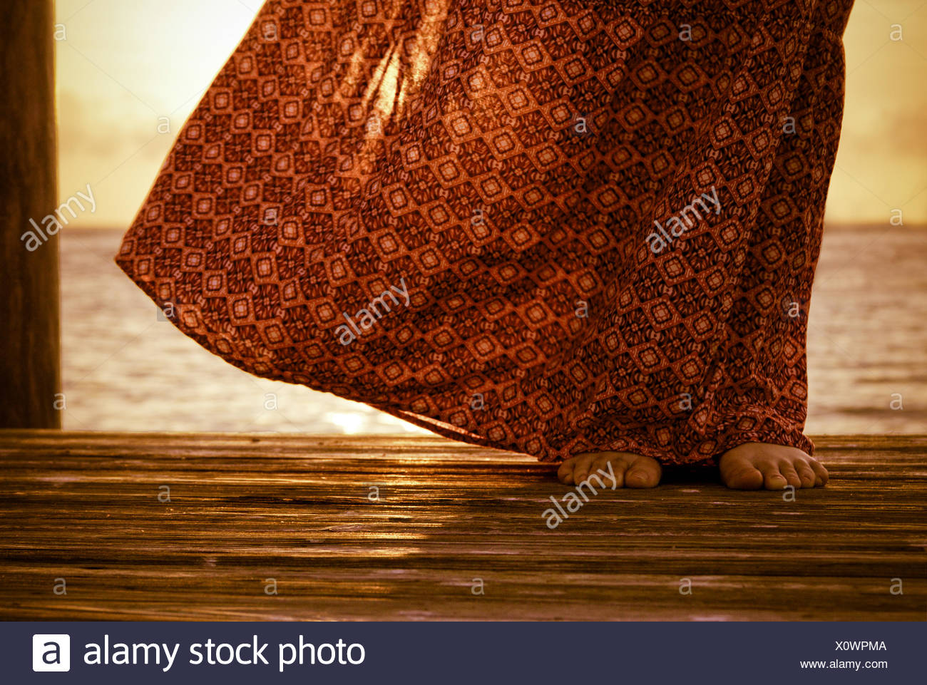 Woman Windy Day Dress High Resolution Stock Photography and Images - Alamy