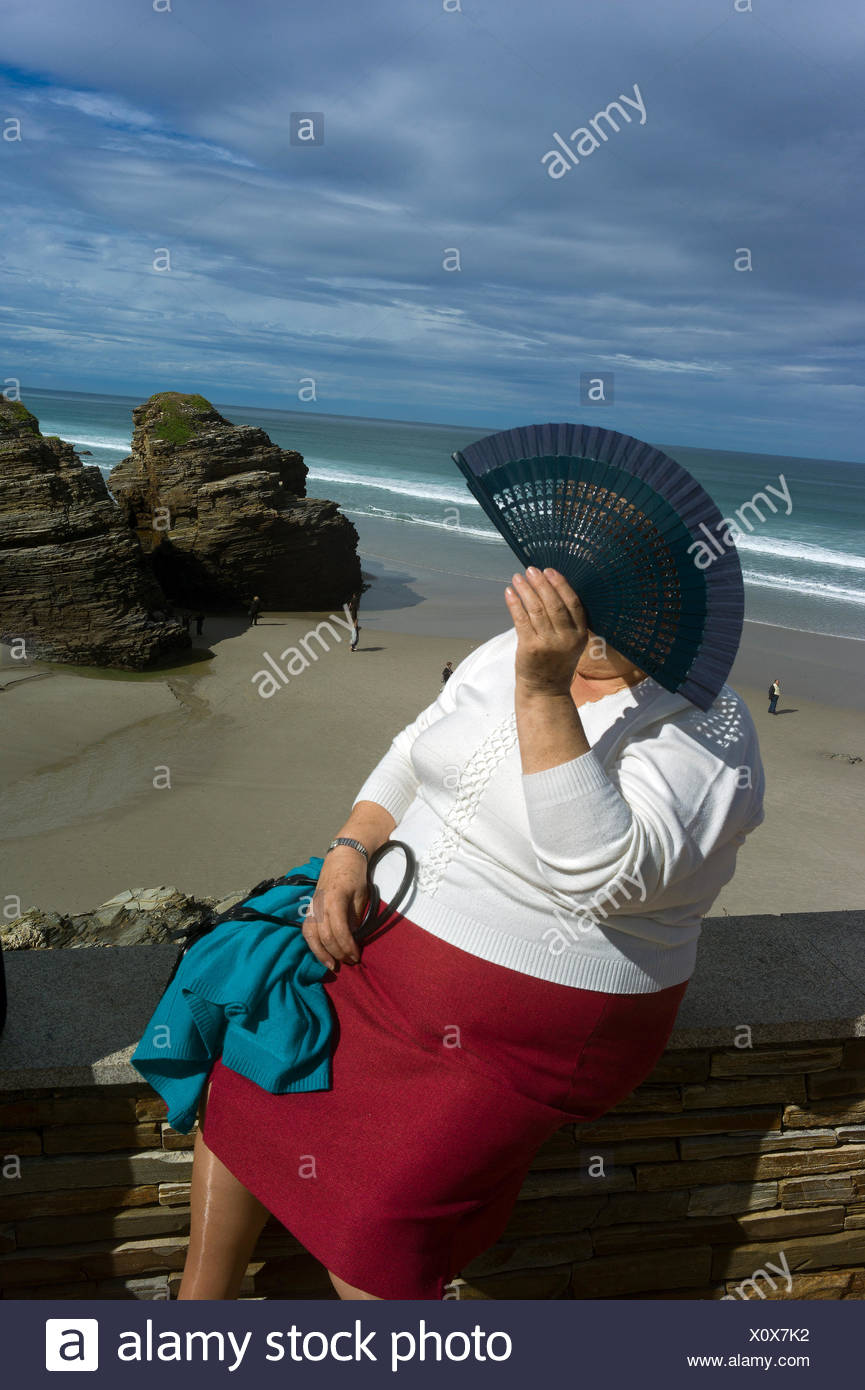 Woman Fanning Herself Stock Photos & Woman Fanning Herself Stock Images ...