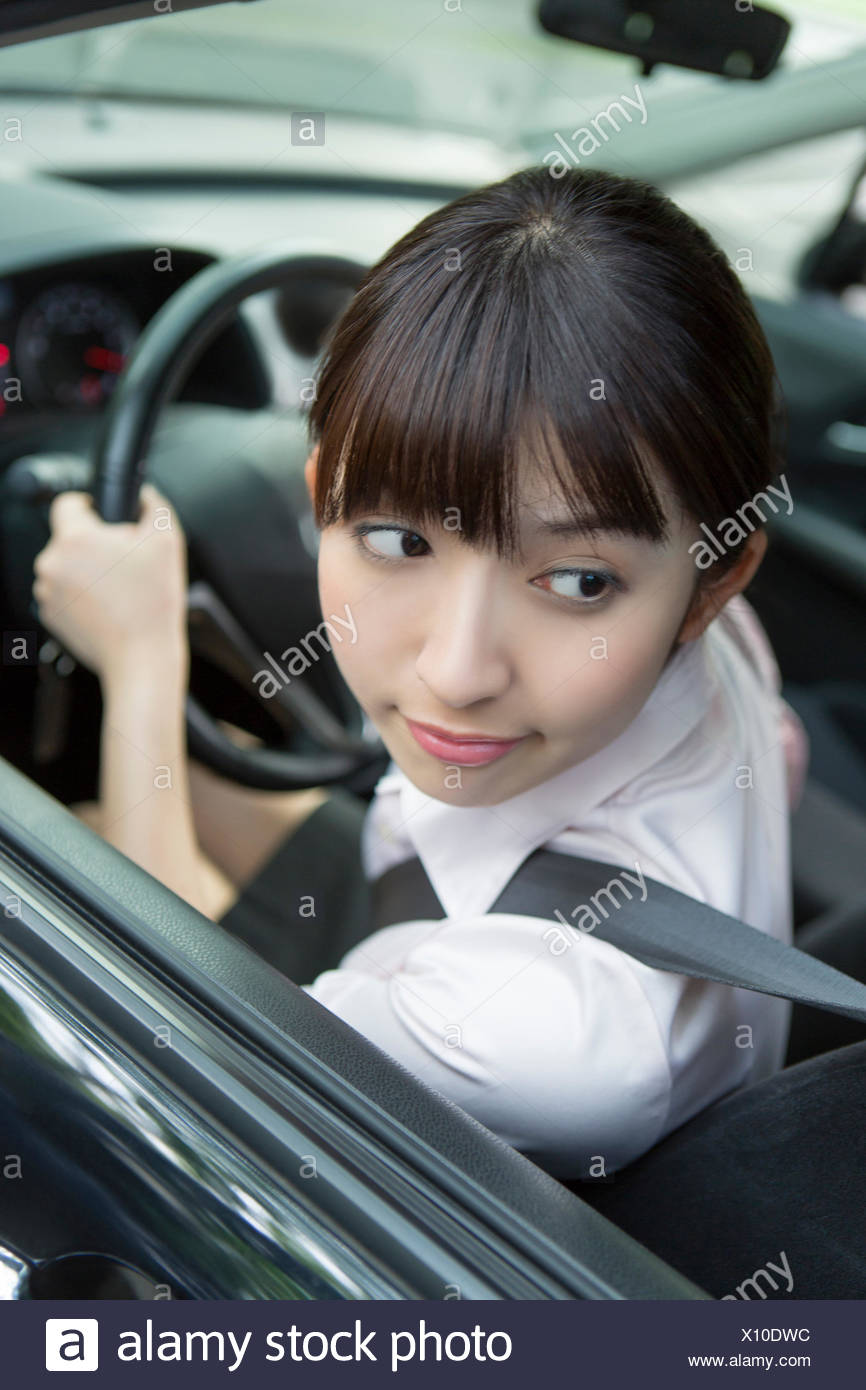 Woman Driving Reversing Car Looking High Resolution Stock Photography ...