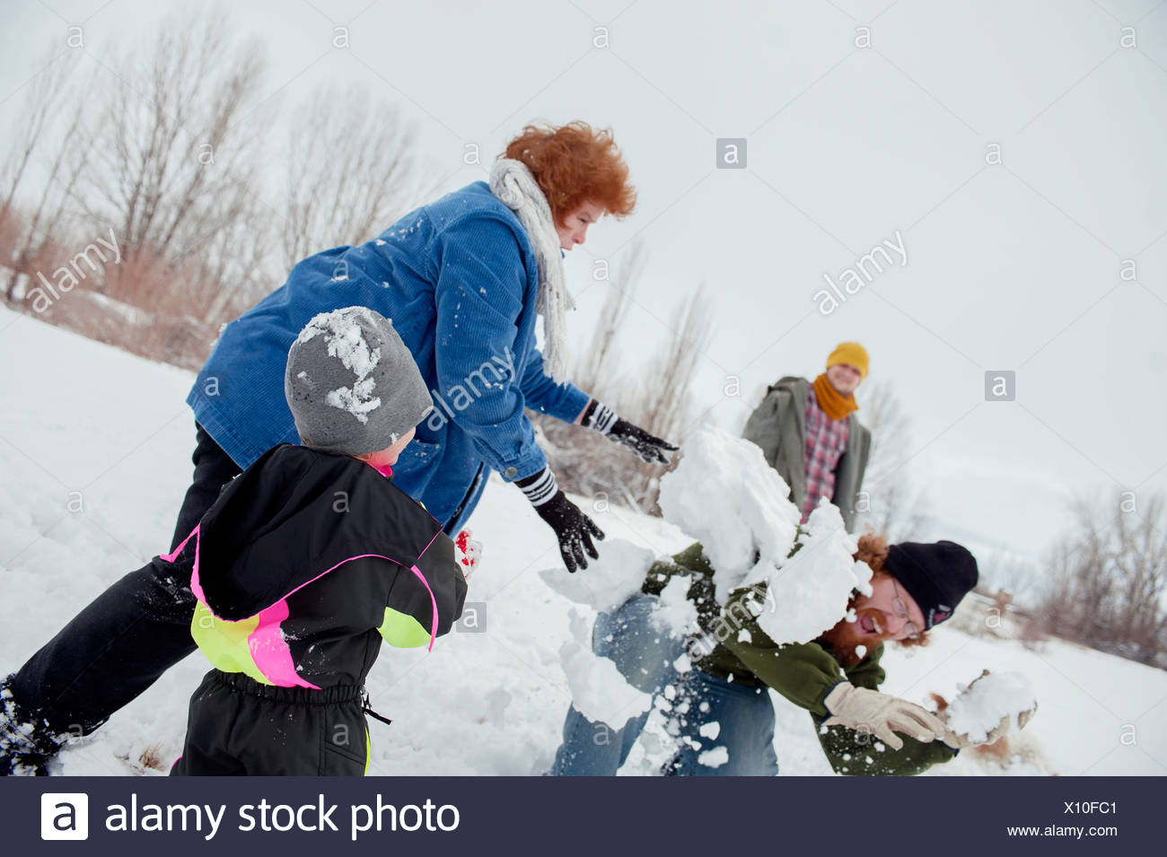Woman Snowball Fight High Resolution Stock Photography and Images - Alamy