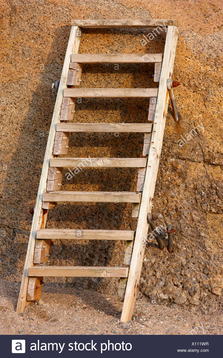 Ladder Leaning Against Wall High Resolution Stock Photography and ...