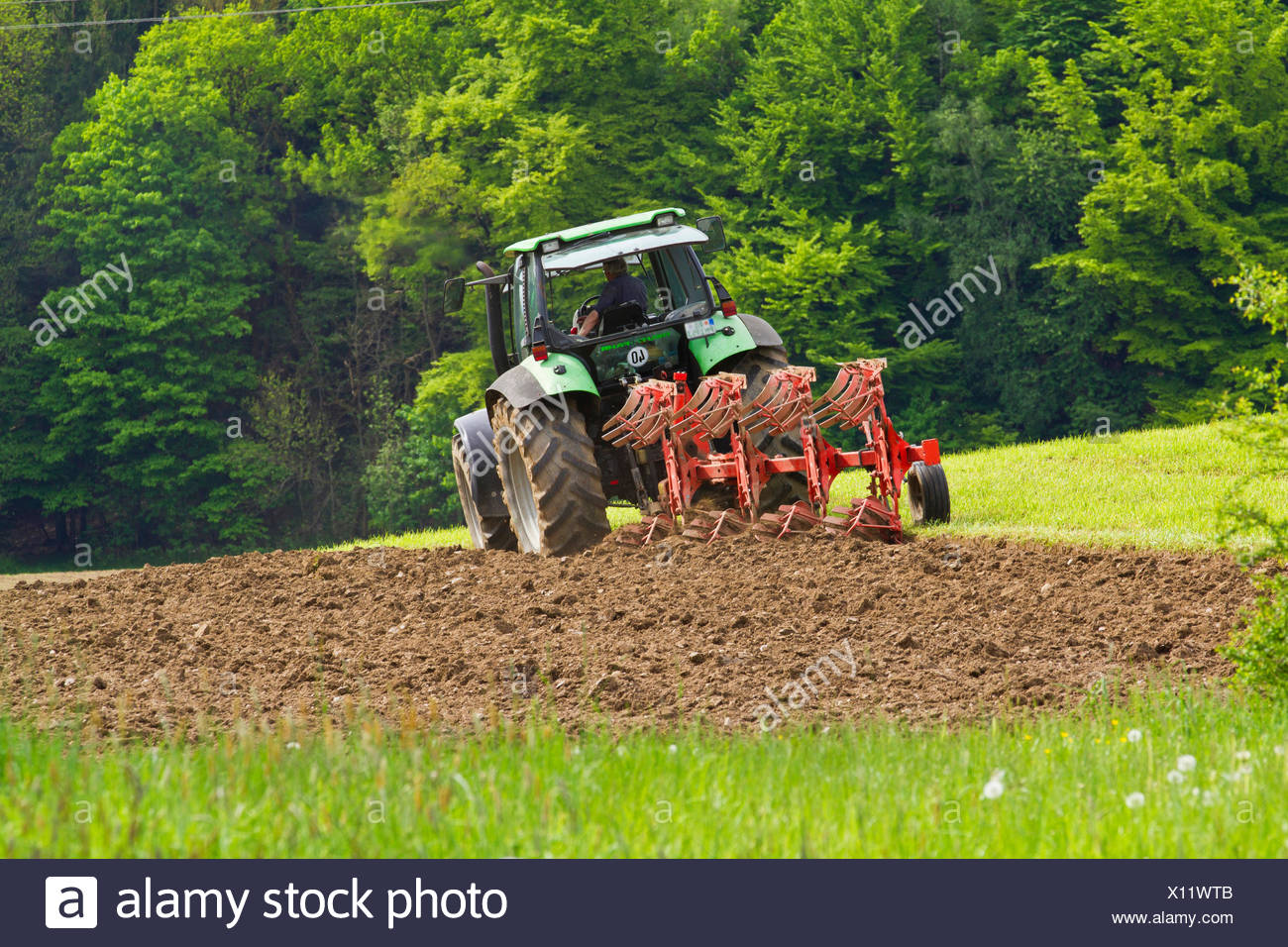 Farmer Plowing A Field Stock Photos & Farmer Plowing A Field Stock ...