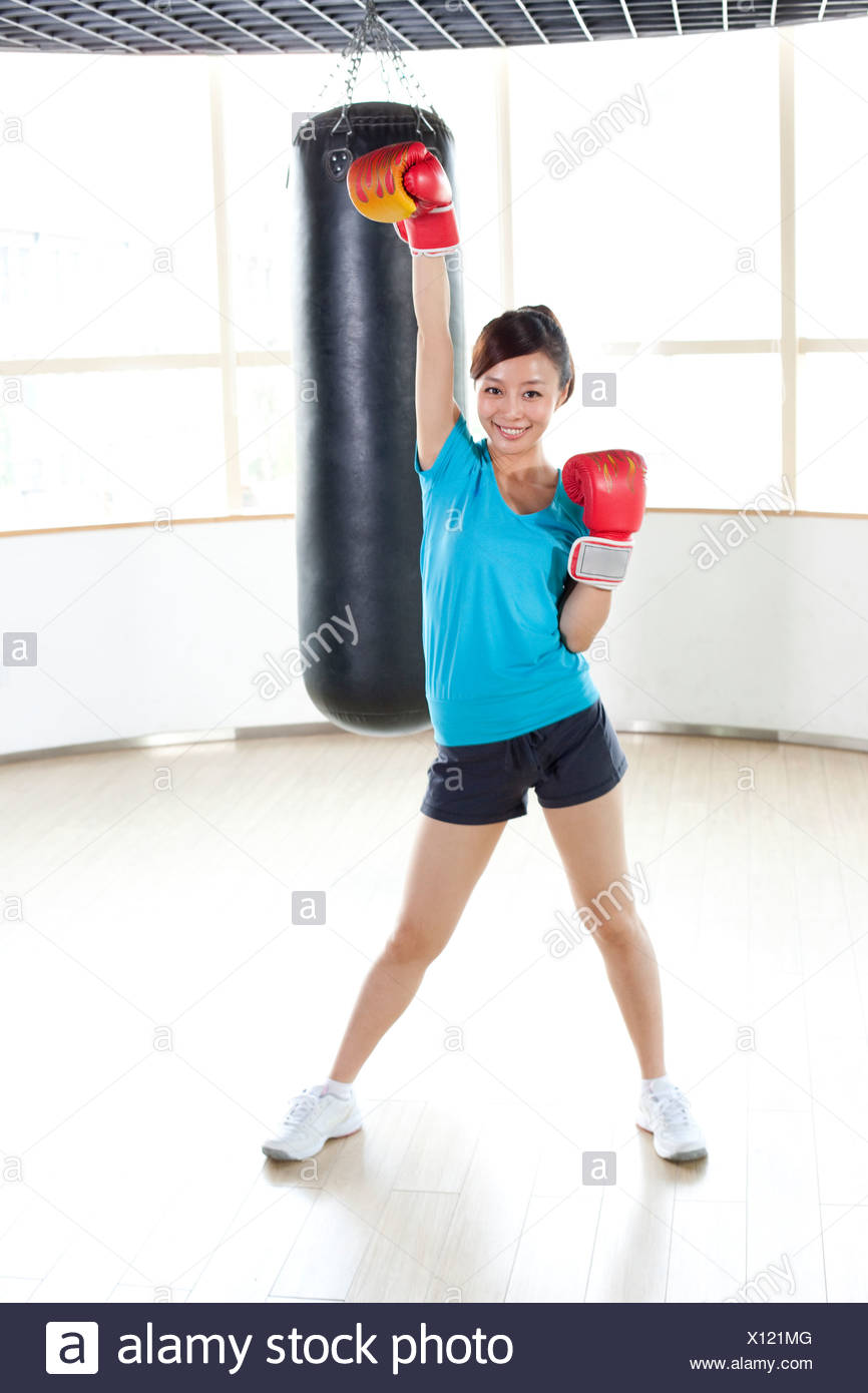 Women Boxing Gloves In Gym High Resolution Stock Photography and Images ...