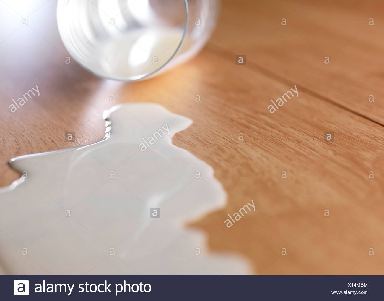 Spilt Glass Of Milk Stock Photos & Spilt Glass Of Milk Stock Images - Alamy