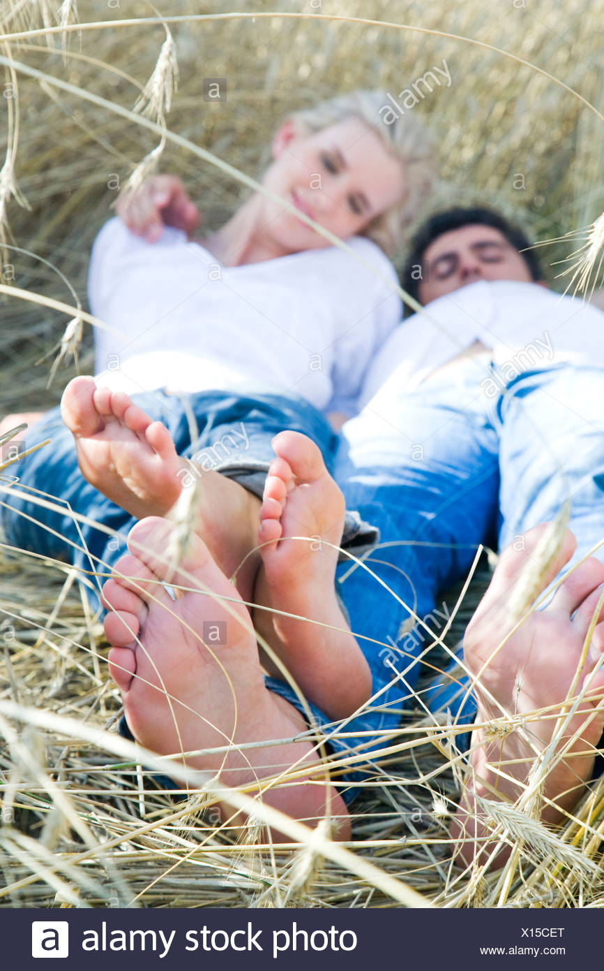 2 People Laying In The Sun High Resolution Stock Photography and Images ...