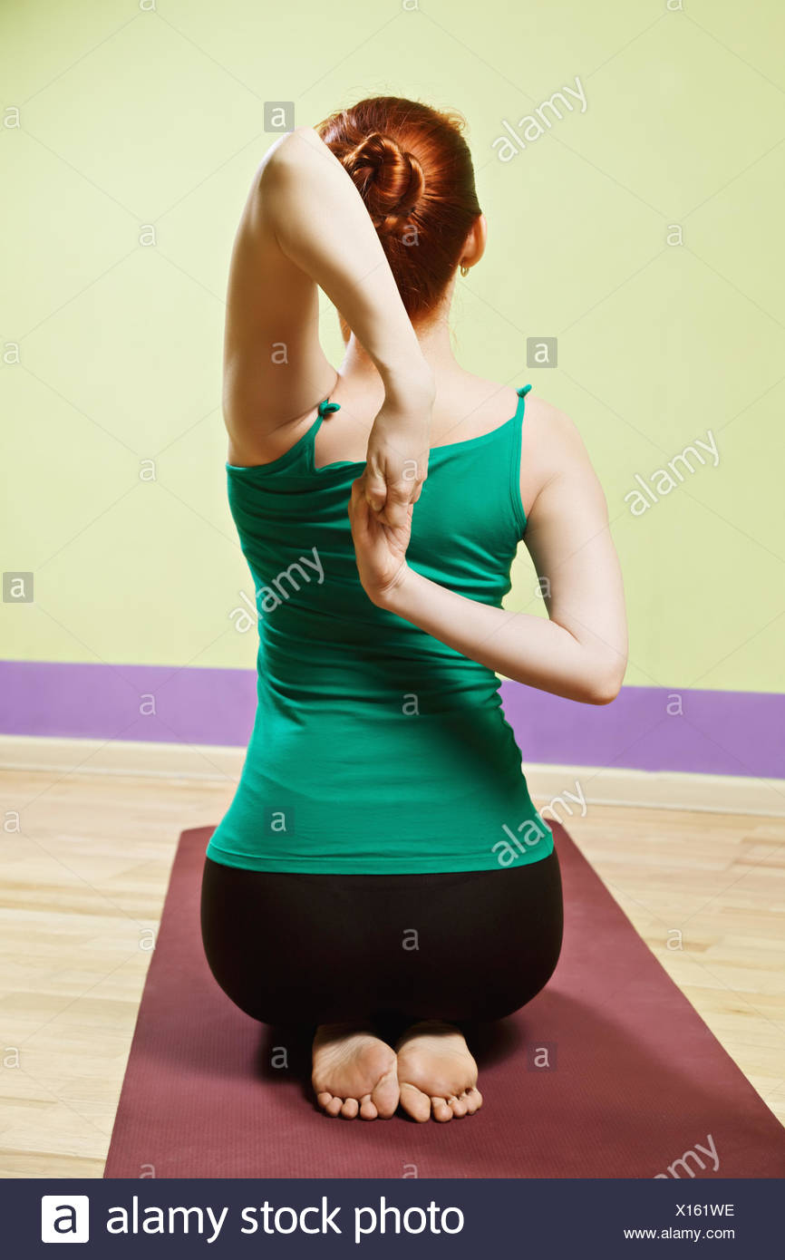 Woman Hands Behind Back Exercise Stock Photos & Woman Hands Behind Back ...