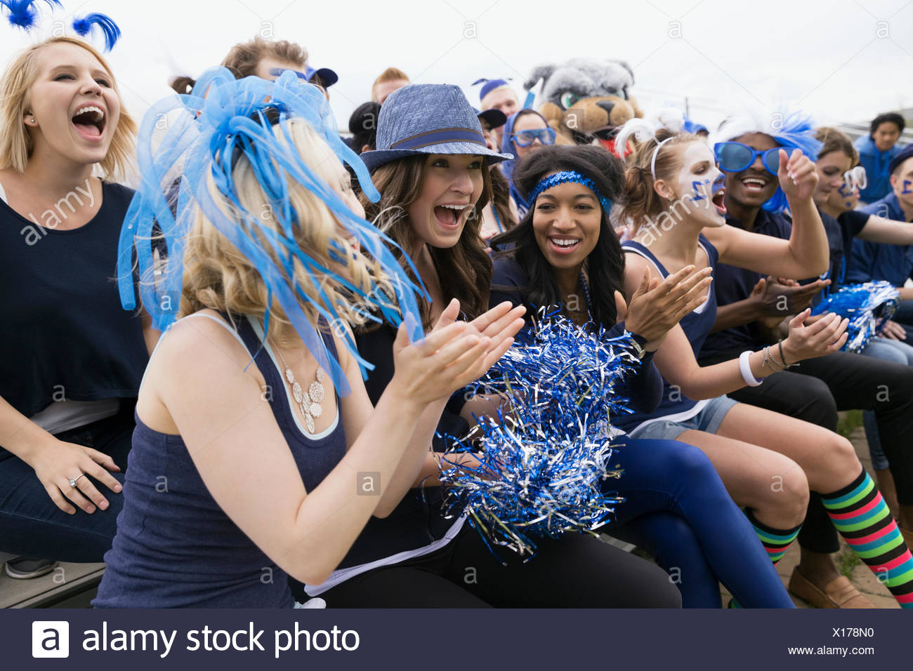 Crowd People Sitting In Bleachers Stock Photos & Crowd People Sitting ...