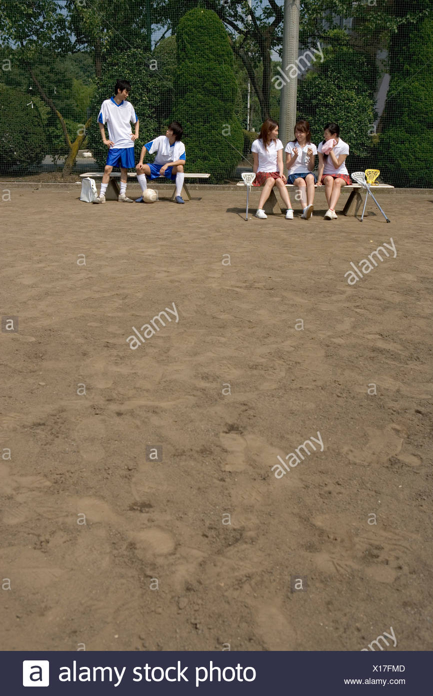 Girls Sitting On Fence High Resolution Stock Photography and Images - Alamy