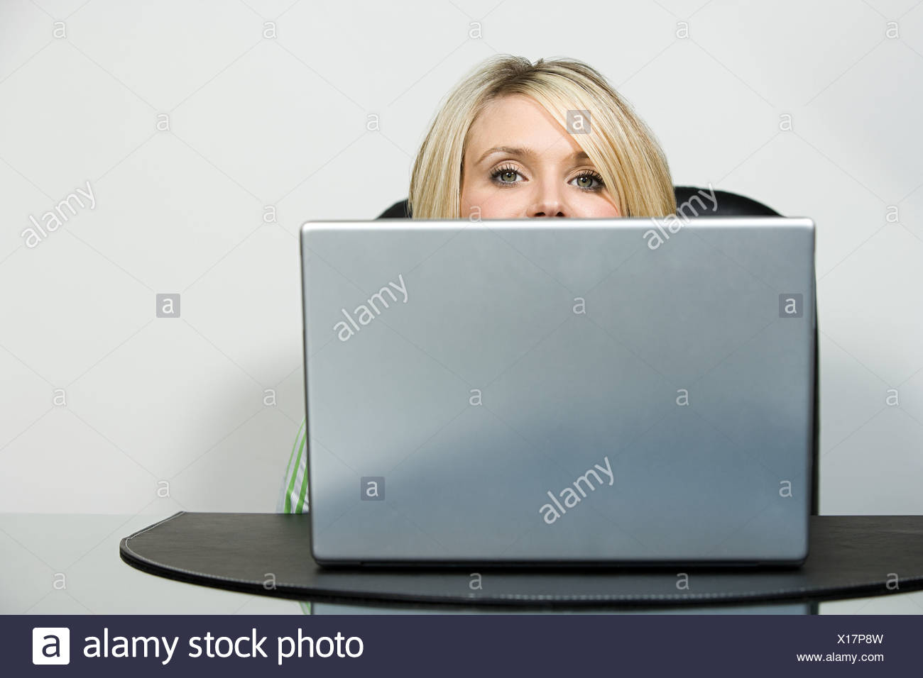 Peeking Over Desk High Resolution Stock Photography and Images - Alamy