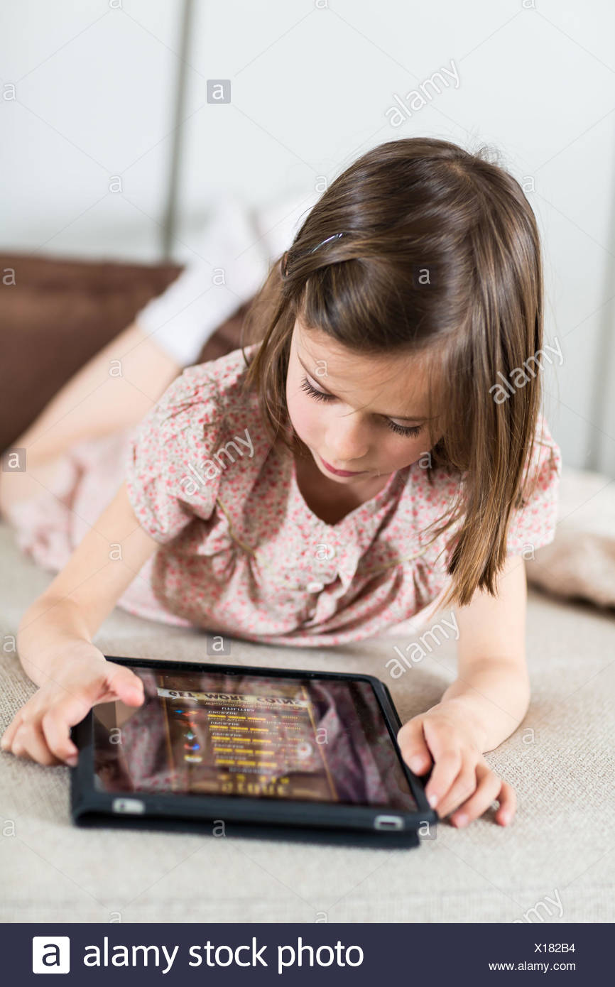 Kid With Ipad High Resolution Stock Photography and Images - Alamy