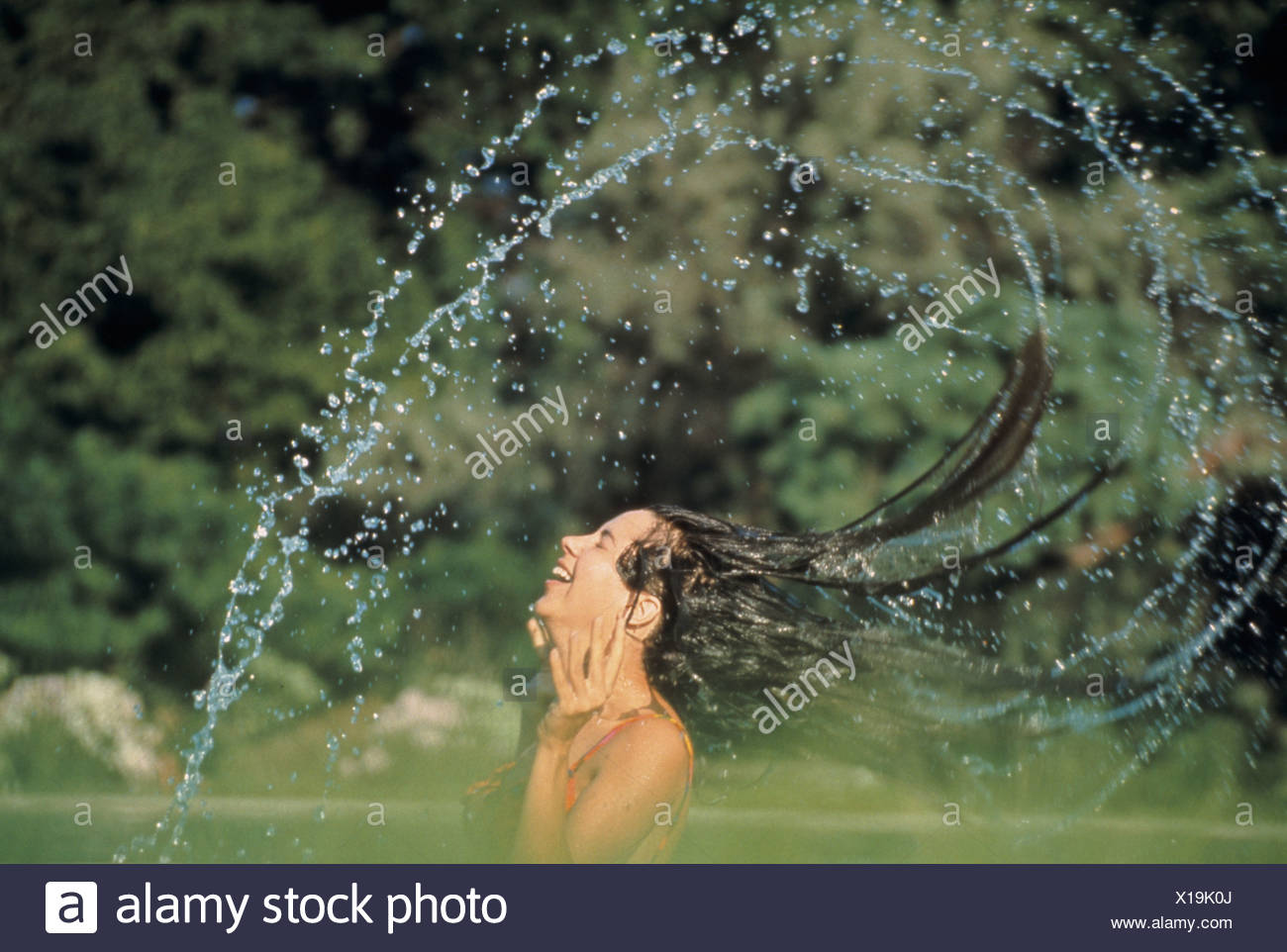 Woman Emerging From Pool High Resolution Stock Photography and Images ...