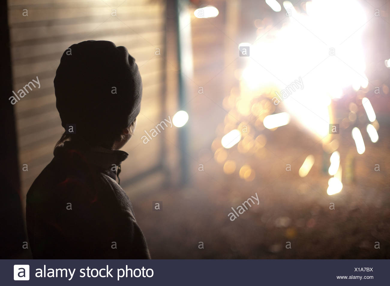 Children Lighting Fireworks Stock Photos & Children Lighting Fireworks ...