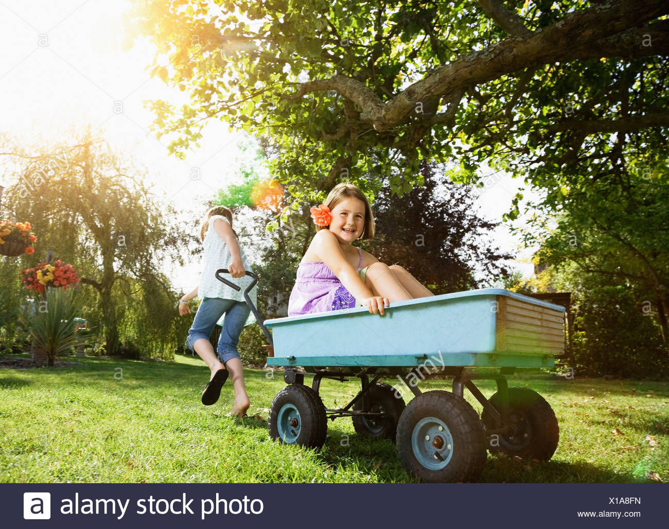 Child Wagon Pulling Stock Photos & Child Wagon Pulling Stock Images - Alamy
