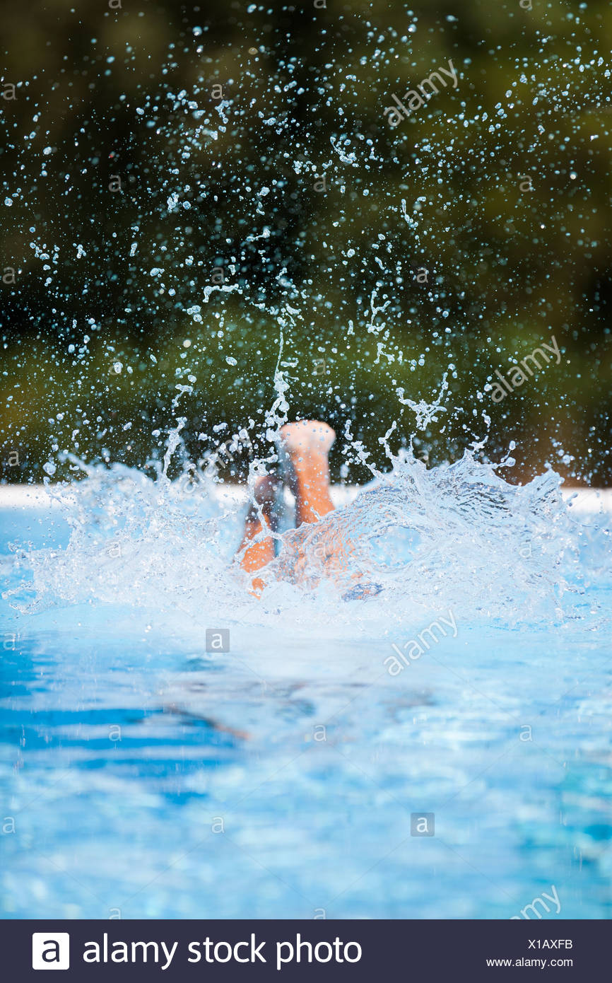 Woman Diving Into Swimming Pool High Resolution Stock Photography and ...