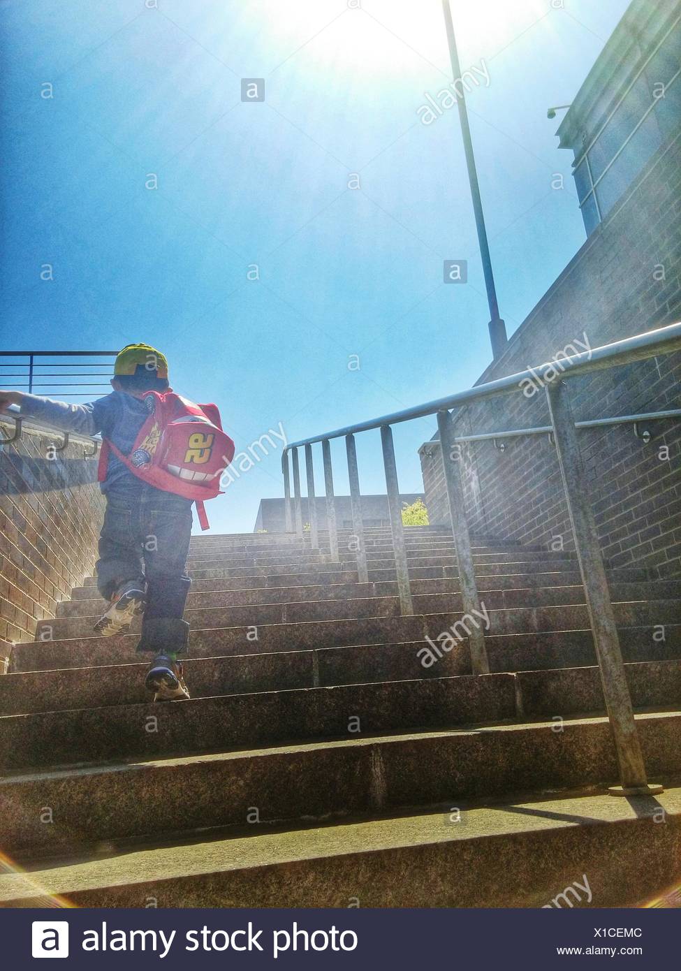 Boy On School Steps High Resolution Stock Photography and Images - Alamy
