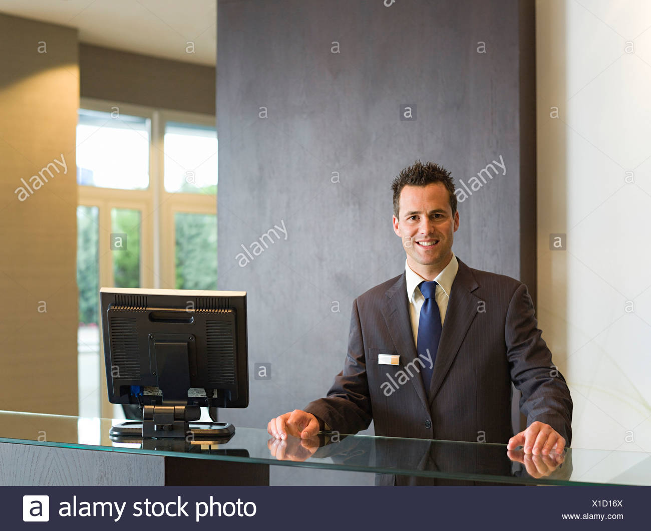 Person At Reception Desk High Resolution Stock Photography and Images ...