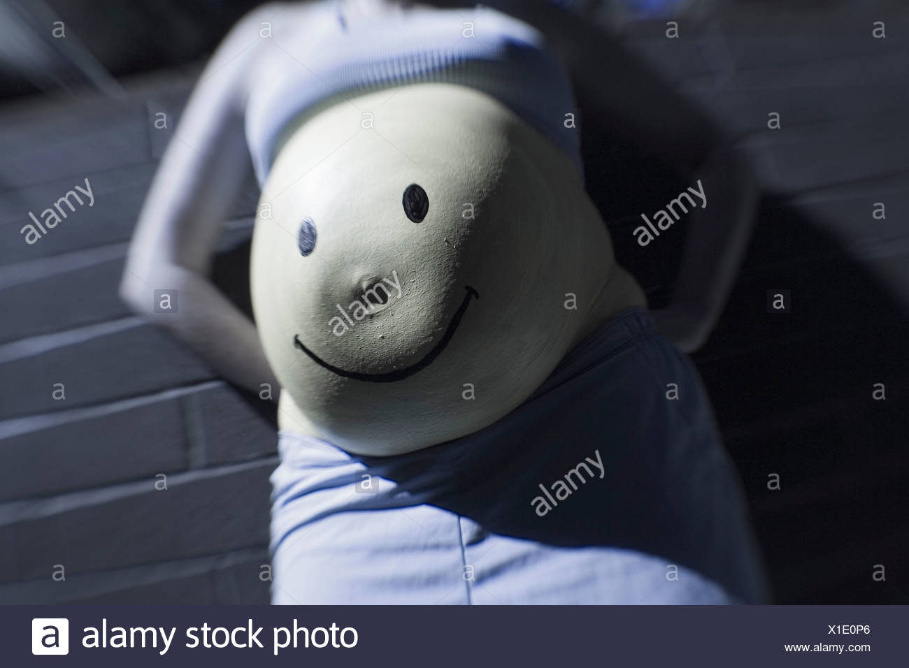 Smiley Face On Stomach High Resolution Stock Photography and Images - Alamy