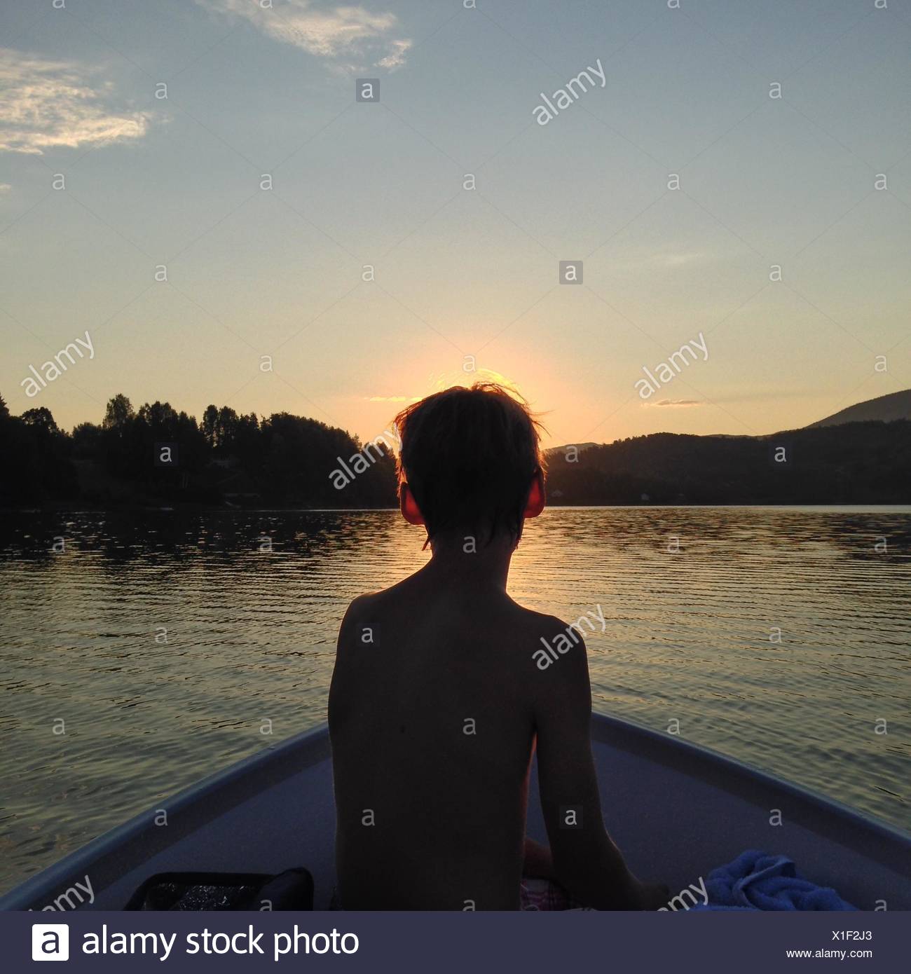 Boy In A Boat High Resolution Stock Photography and Images - Alamy