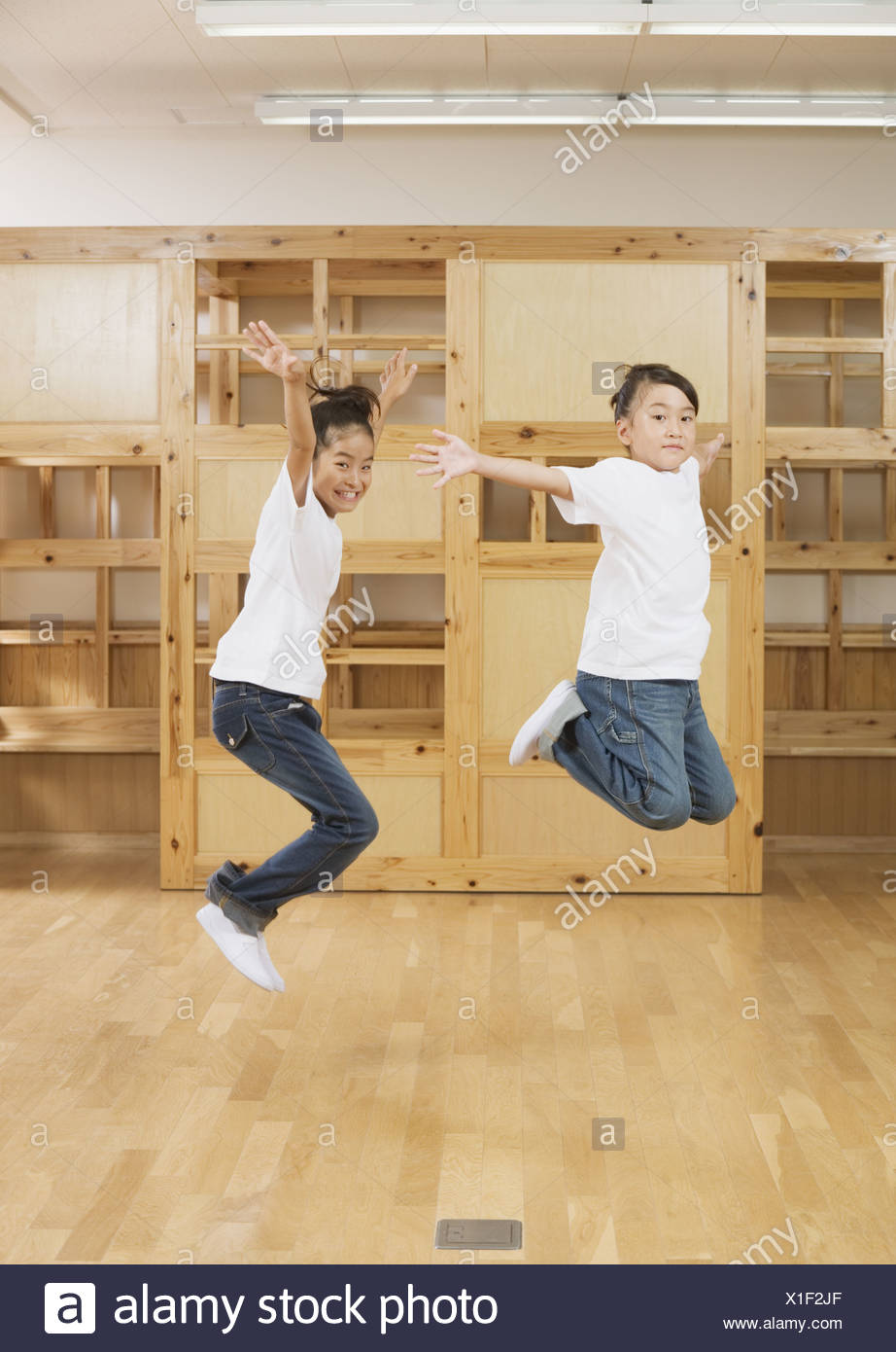 School Students Jumping Stock Photos & School Students Jumping Stock ...