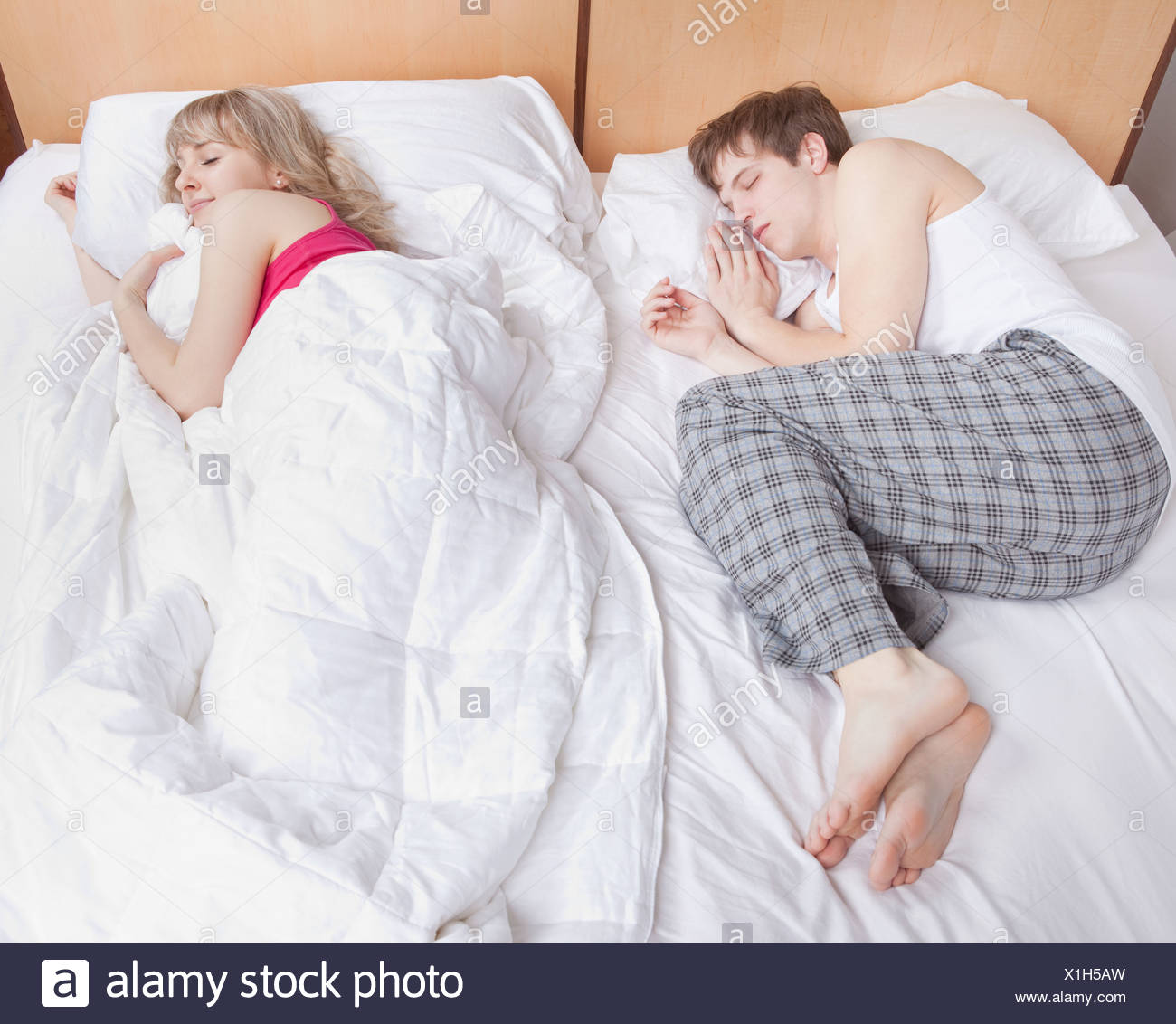 Couple Sleeping In Bedroom Stock Photos & Couple Sleeping In Bedroom ...