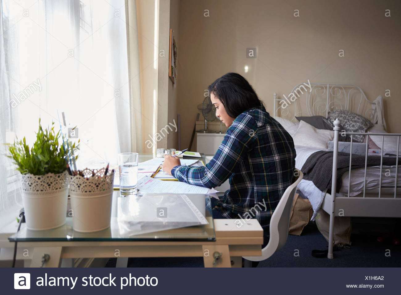 Female University Student At Desk Home Stock Photos & Female University ...