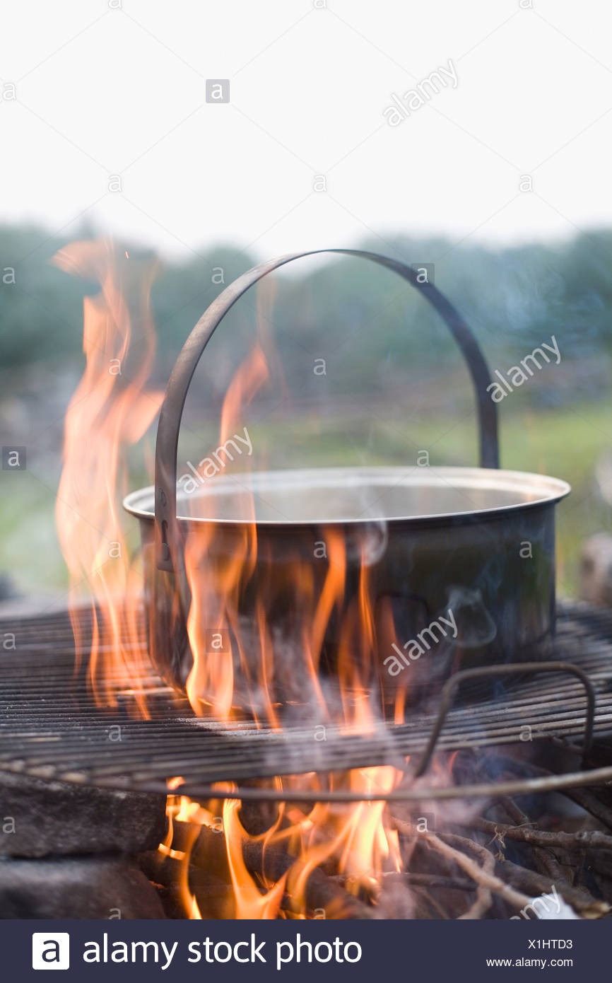 Boiling Water On Campfire Stock Photos & Boiling Water On Campfire ...