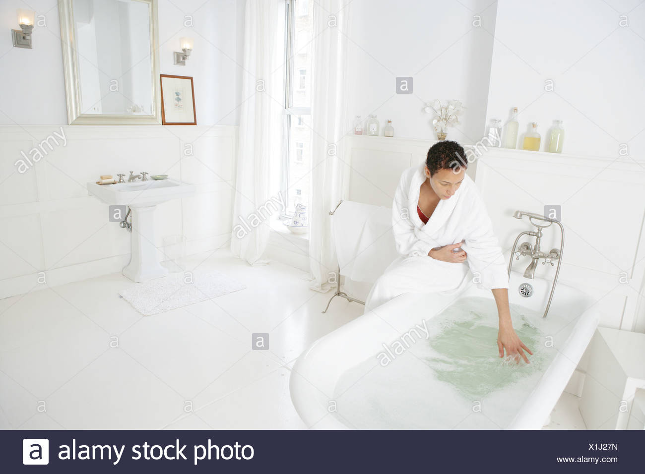 African Woman Taking Bath Stock Photos & African Woman Taking Bath ...