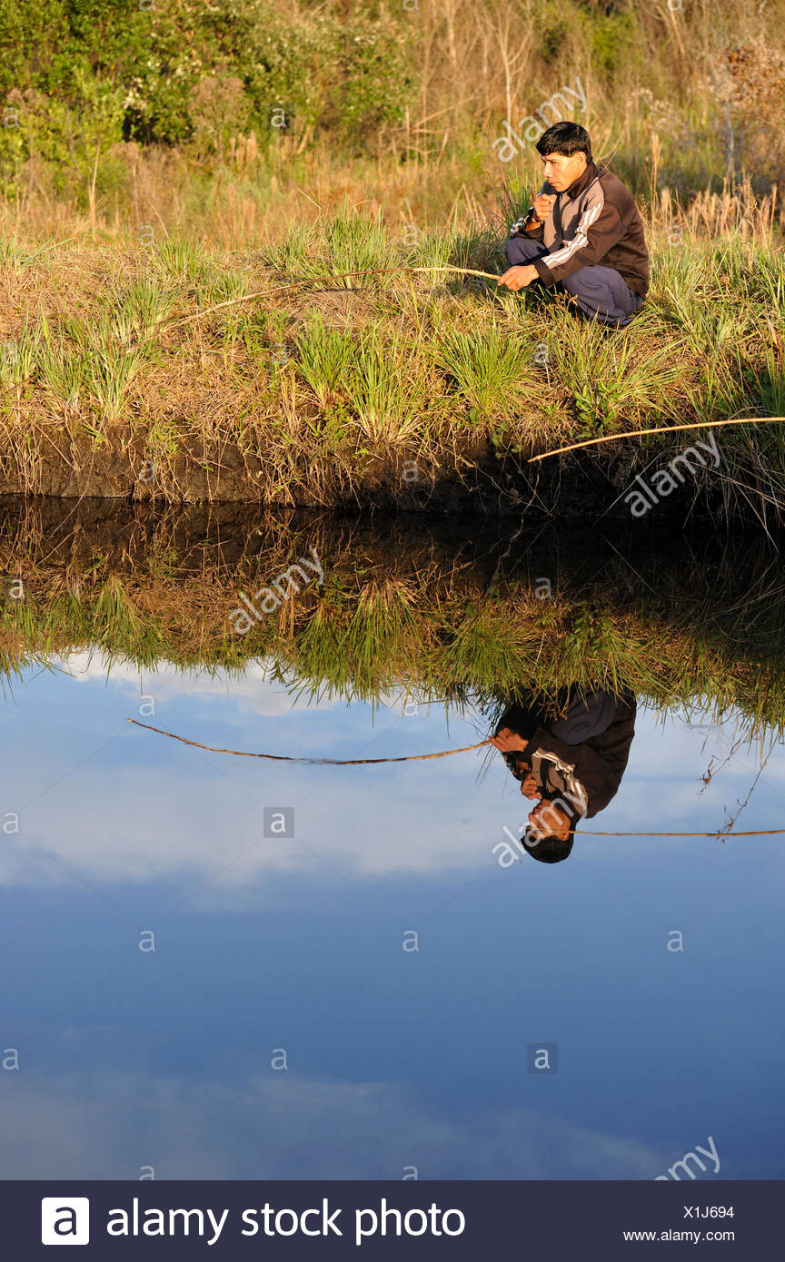 Indigenous Man Fishing High Resolution Stock Photography and Images - Alamy