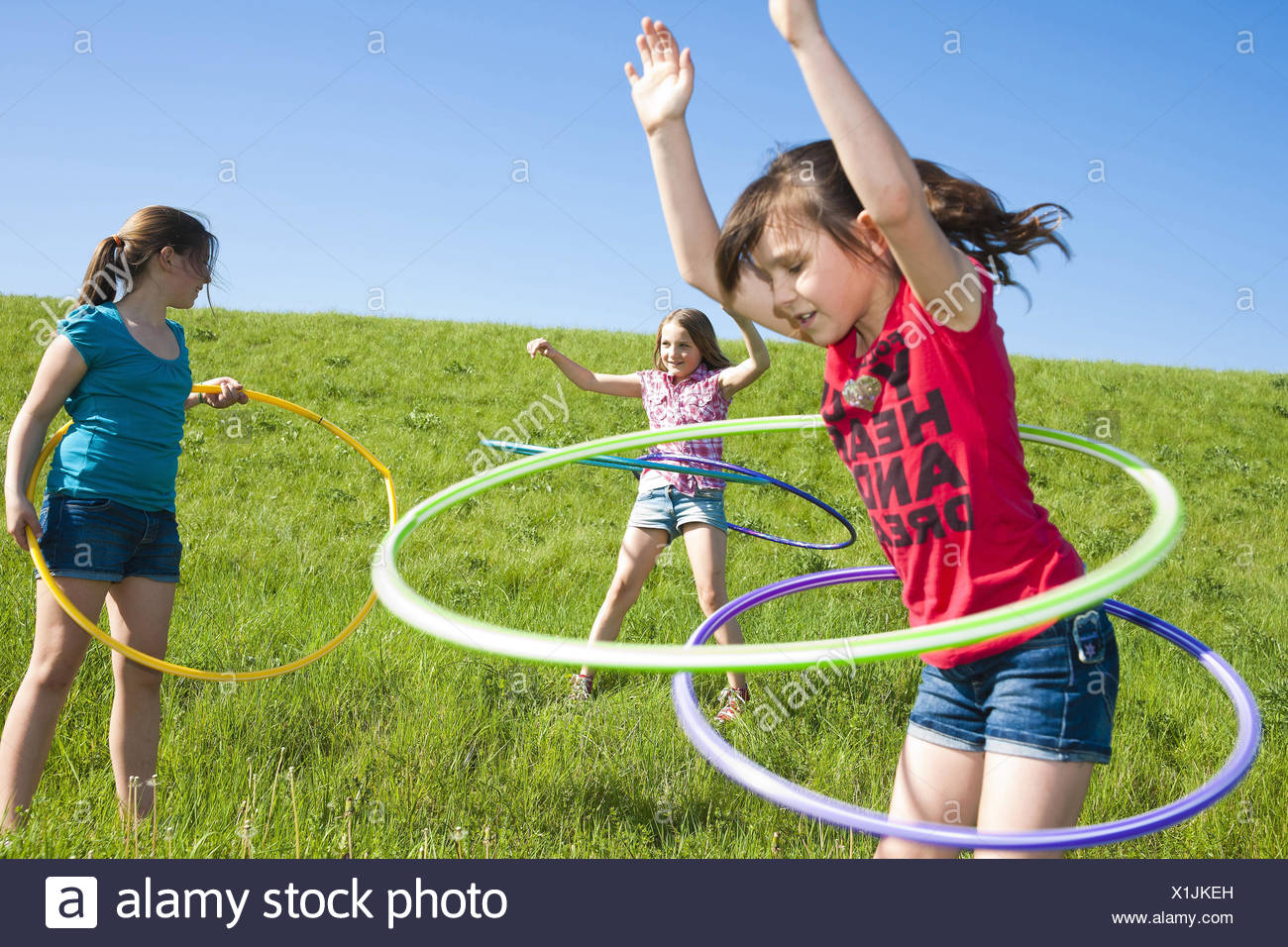 Hula Hoop Game Children Stock Photos & Hula Hoop Game Children Stock ...