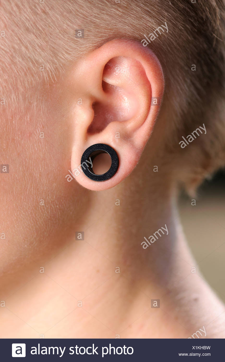 Ear Piercing Male High Resolution Stock Photography and Images - Alamy