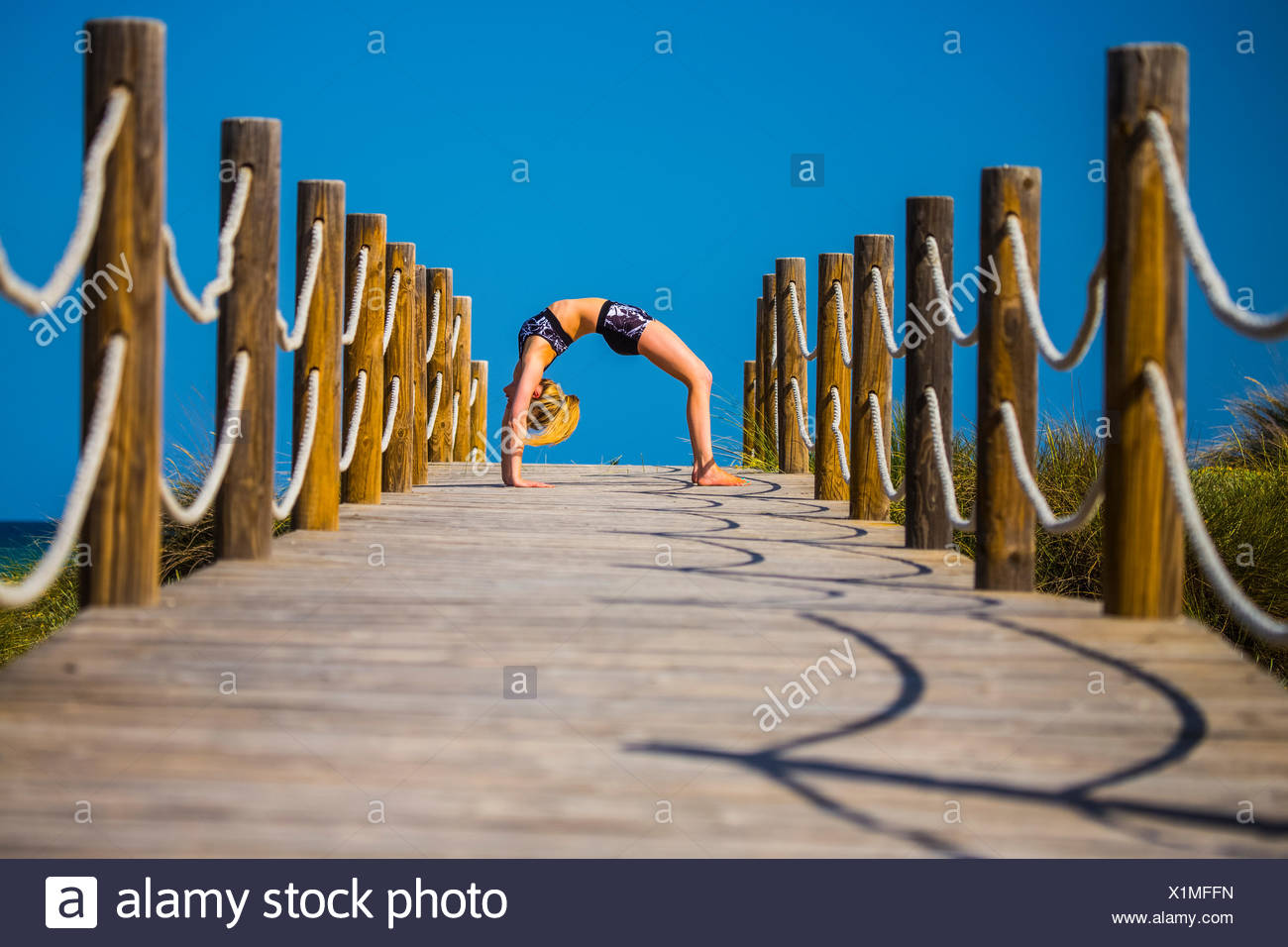 Bent Over Backwards High Resolution Stock Photography and Images - Alamy