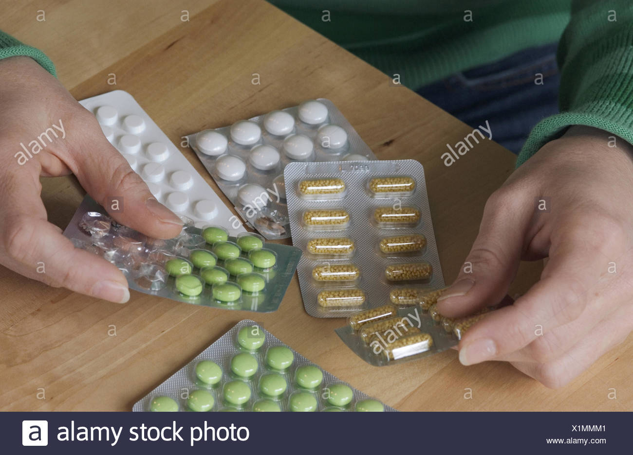Hand With Packets Of High Resolution Stock Photography and Images - Alamy