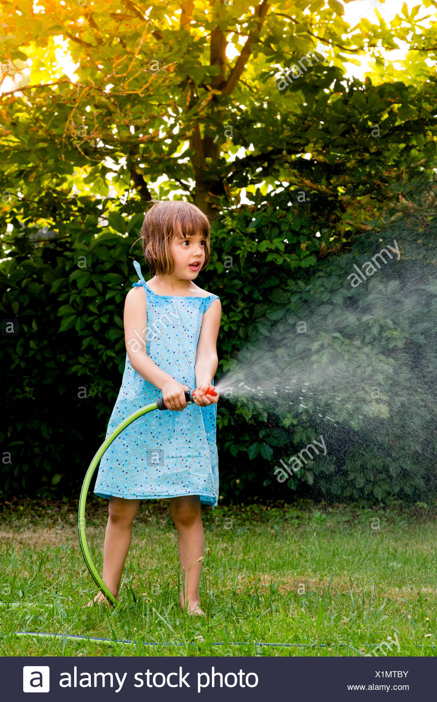Water Hose Garden Heat Girl High Resolution Stock Photography and ...