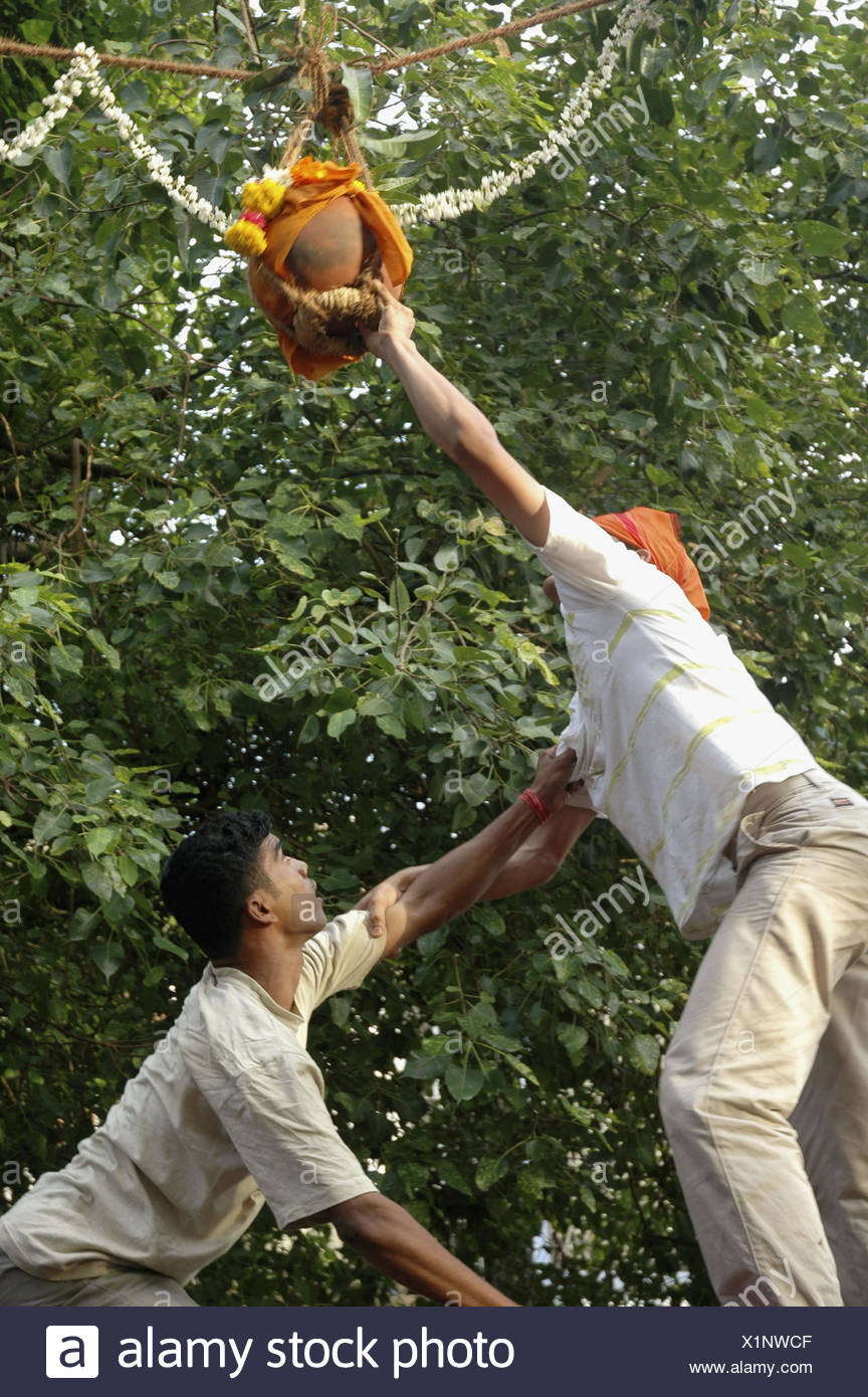 Boys In Human Pyramid Break Pot High Resolution Stock Photography and ...
