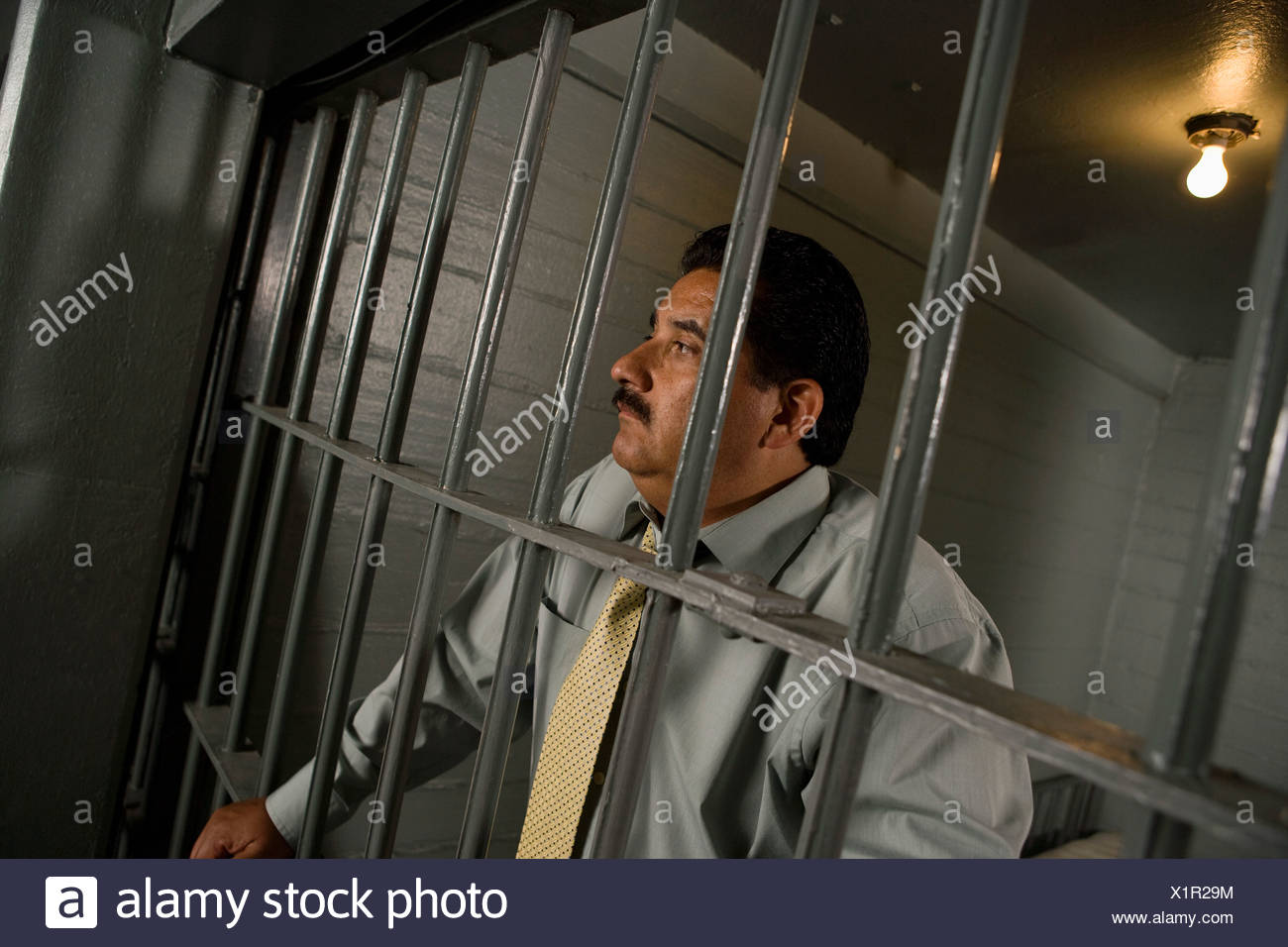 Behind Bars And Man Stock Photos & Behind Bars And Man Stock Images - Alamy
