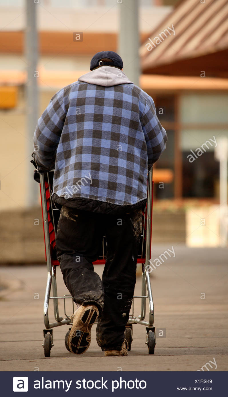 Homeless Man Pushing Shopping Cart High Resolution Stock Photography ...