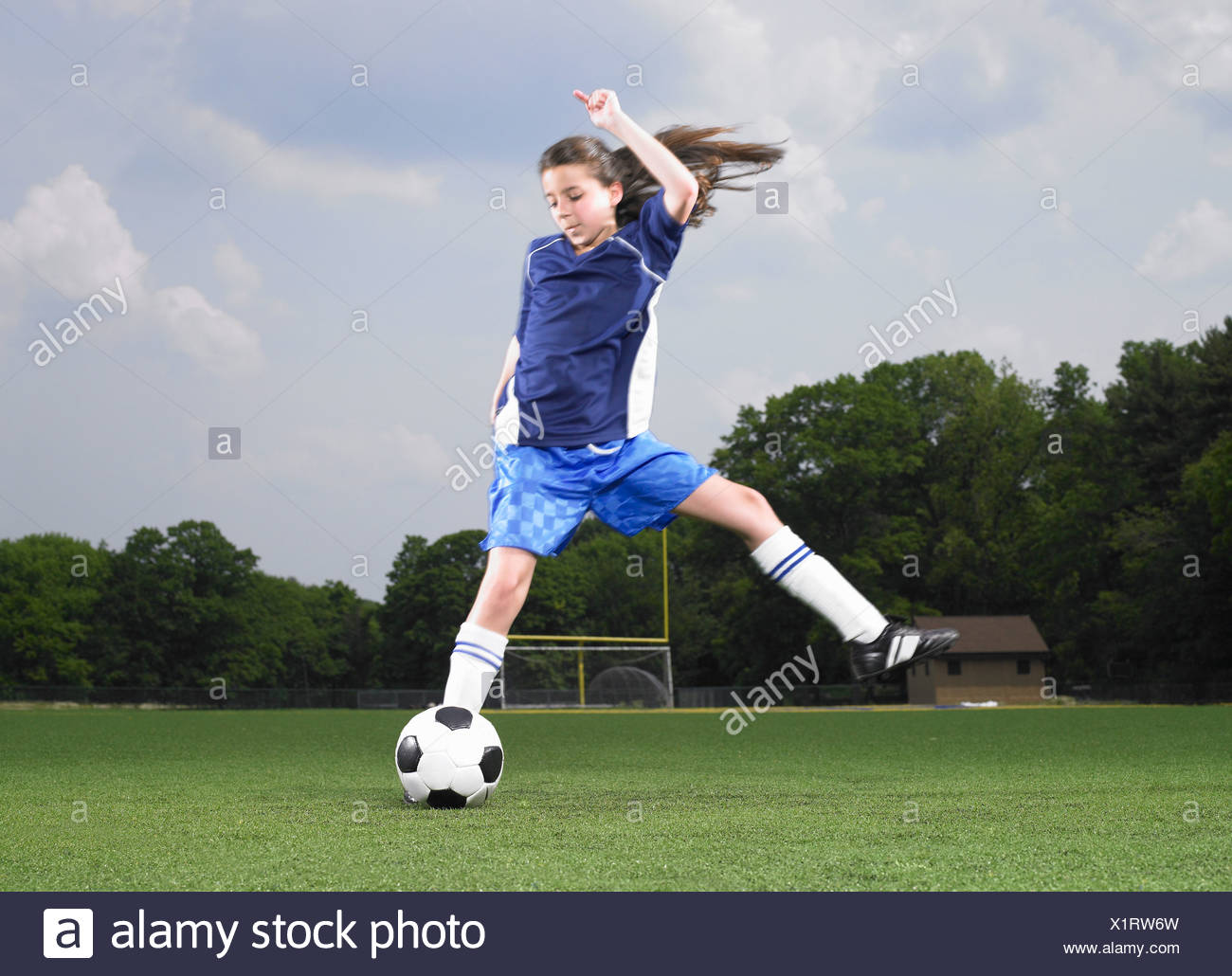 Footballer Kicking Ball Stock Photos & Footballer Kicking Ball Stock ...