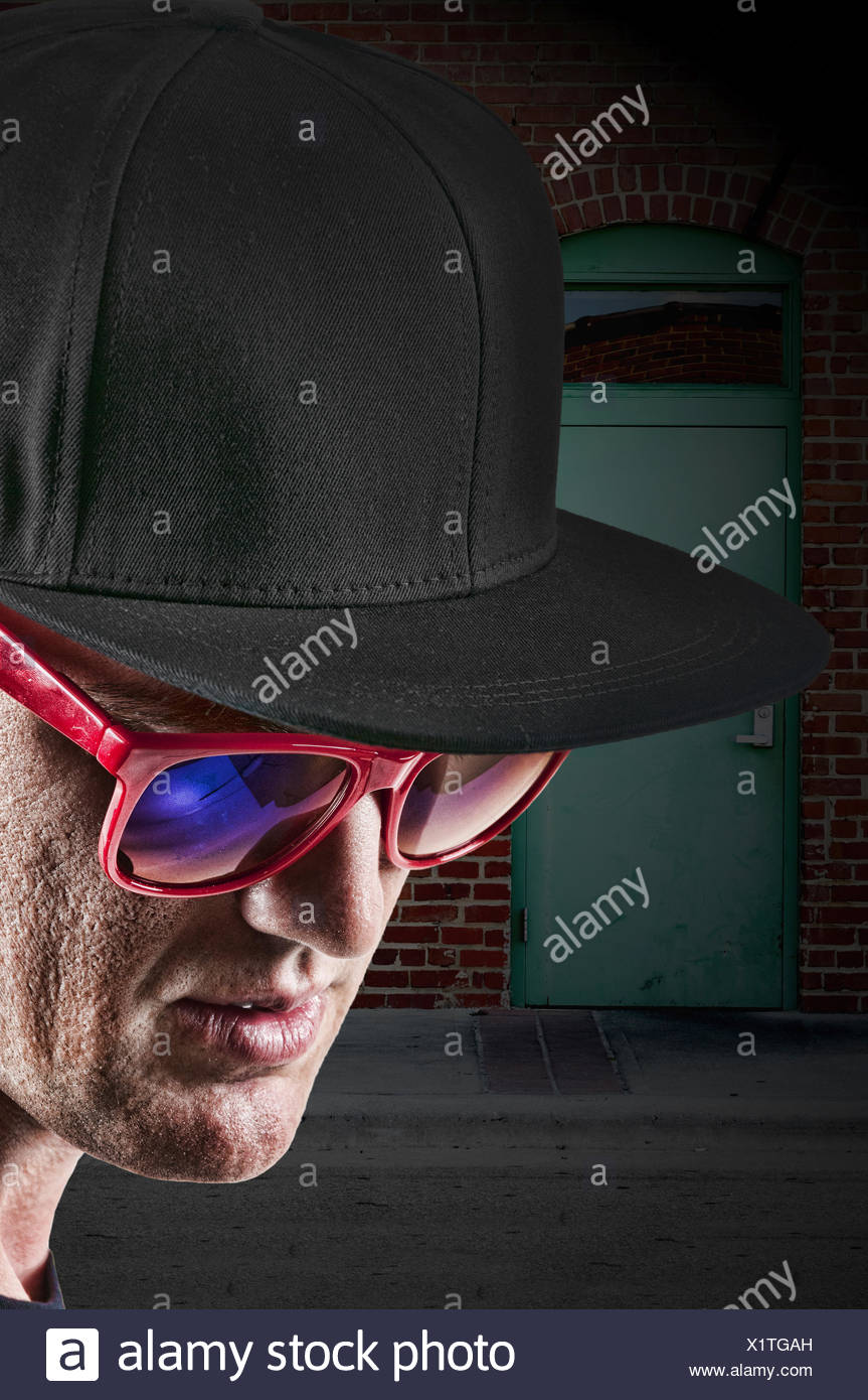 Wearing A Baseball Cap Sunglasses High Resolution Stock Photography and ...