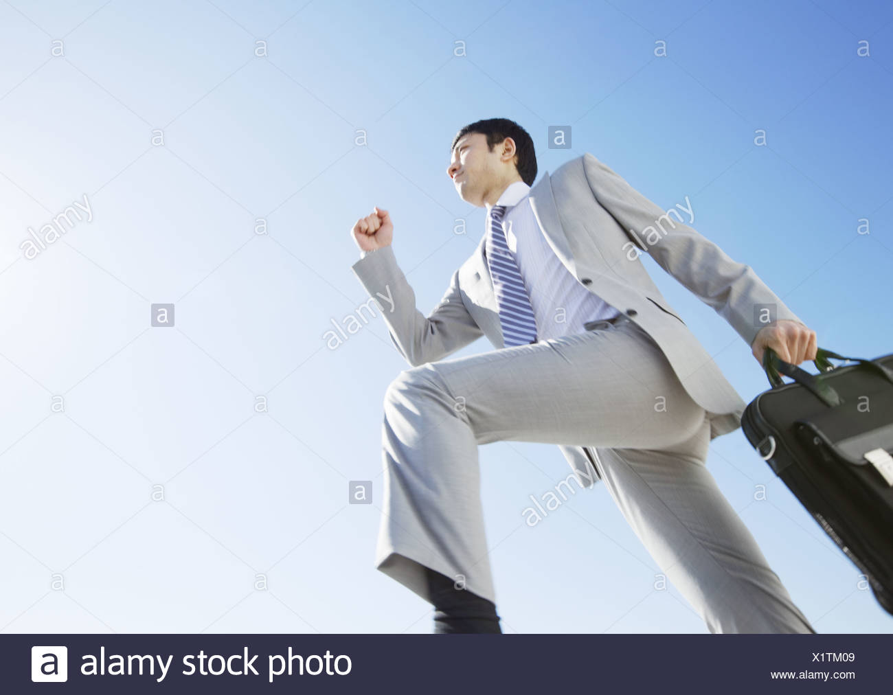 Running Businessman High Resolution Stock Photography and Images - Alamy