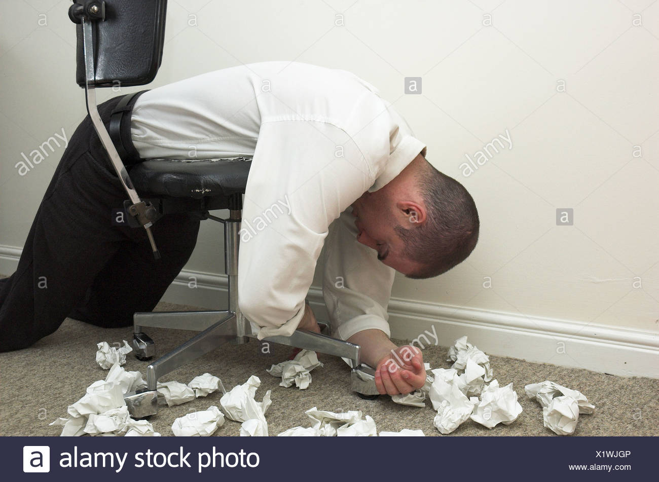 Man And Slumped And Chair High Resolution Stock Photography and Images ...