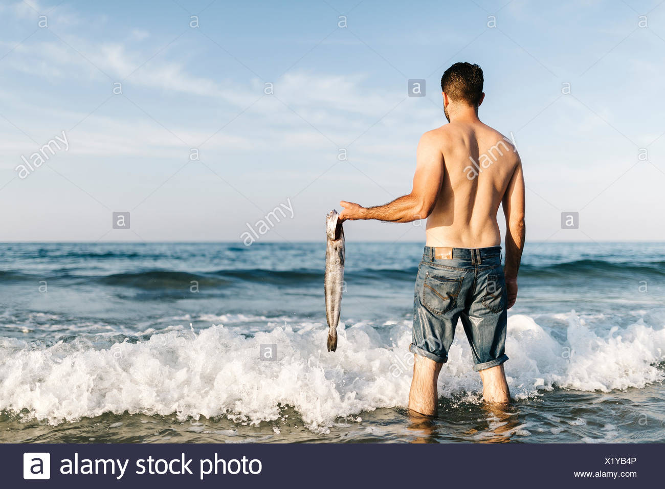 Man Standing Back View High Resolution Stock Photography and Images - Alamy