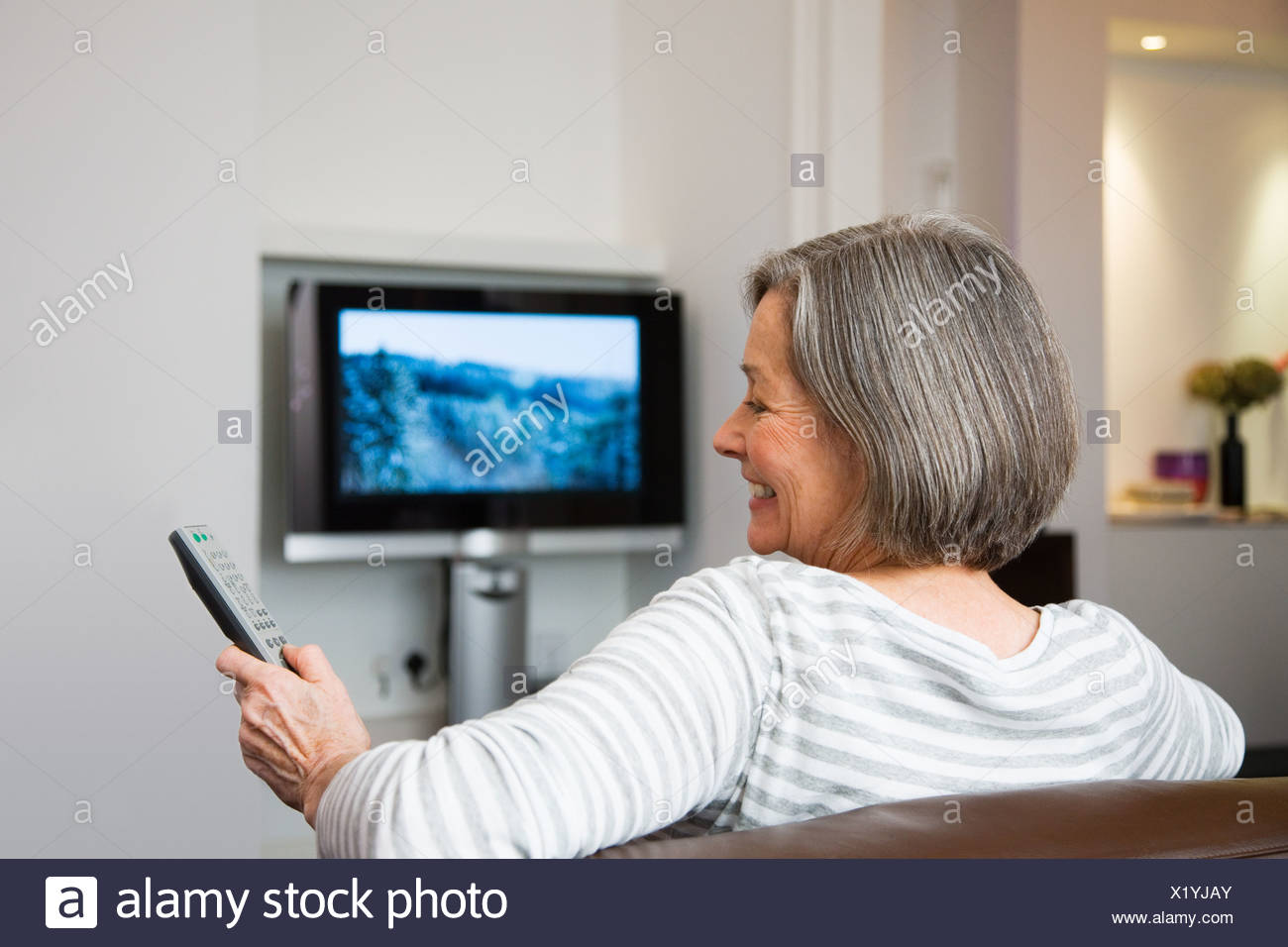 Woman Alone Watching Tv Stock Photos & Woman Alone Watching Tv Stock ...