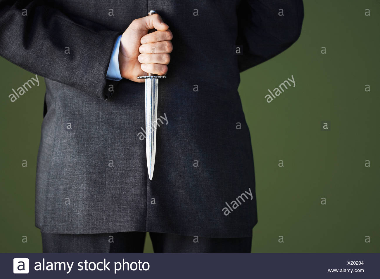 Knife Behind Back High Resolution Stock Photography and Images - Alamy