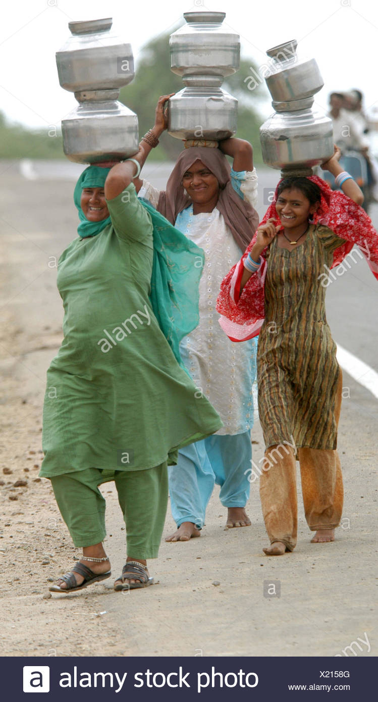 Tribal Women Carrying Water Pot High Resolution Stock Photography and ...