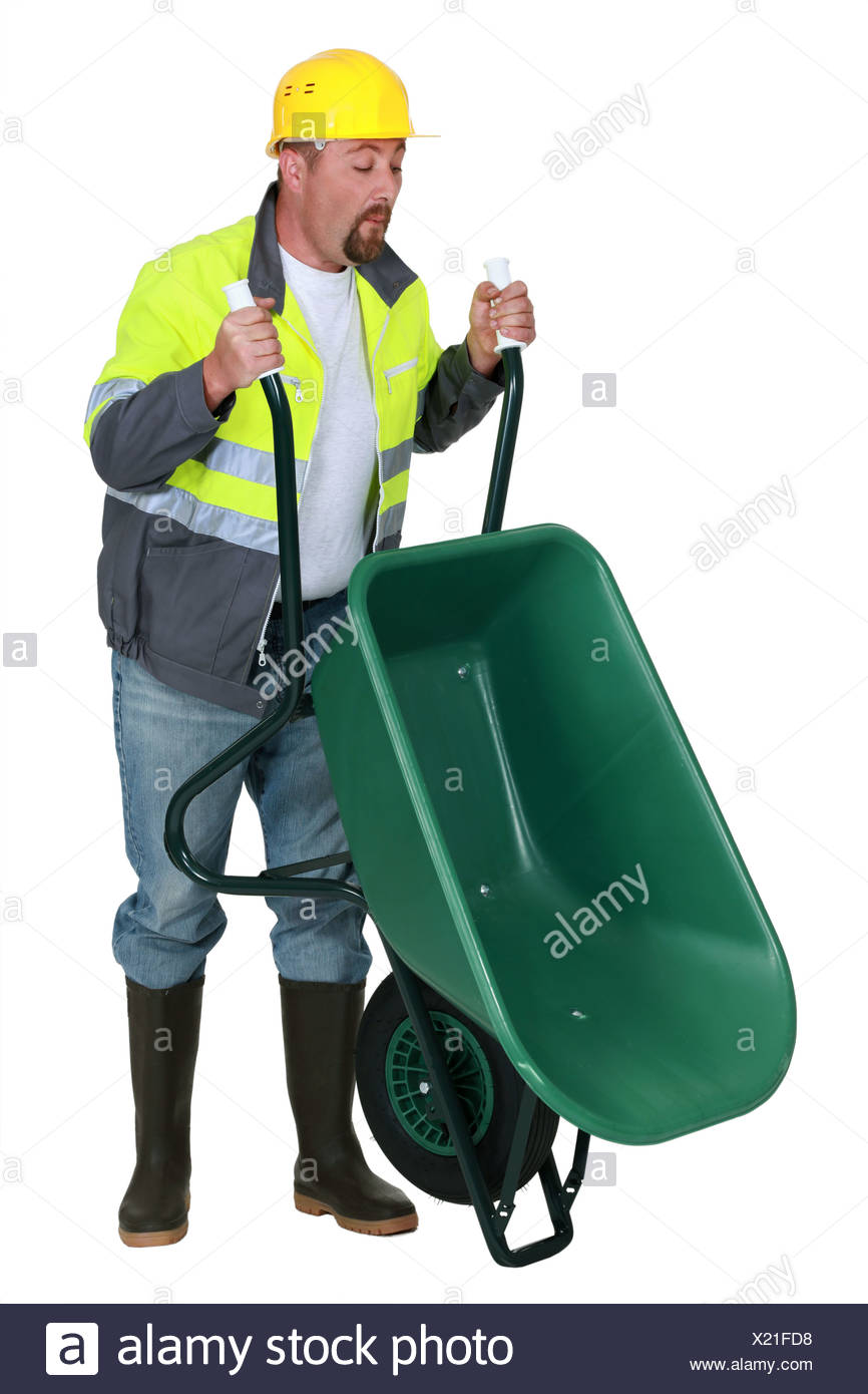 Man Lifting Wheelbarrow High Resolution Stock Photography and Images ...