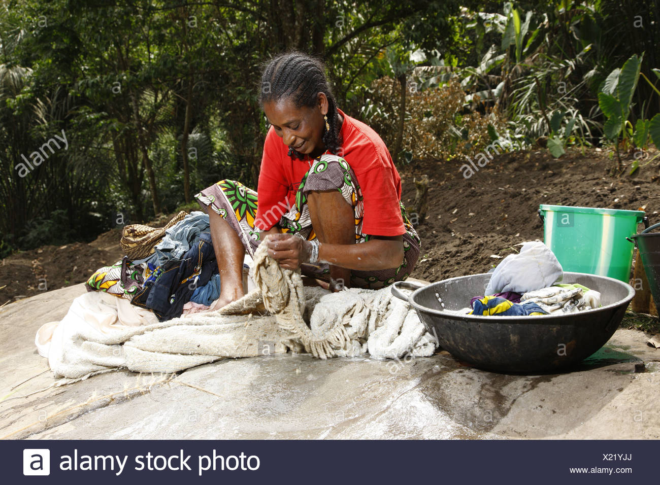 Washing Clothes Africa Women High Resolution Stock Photography and ...